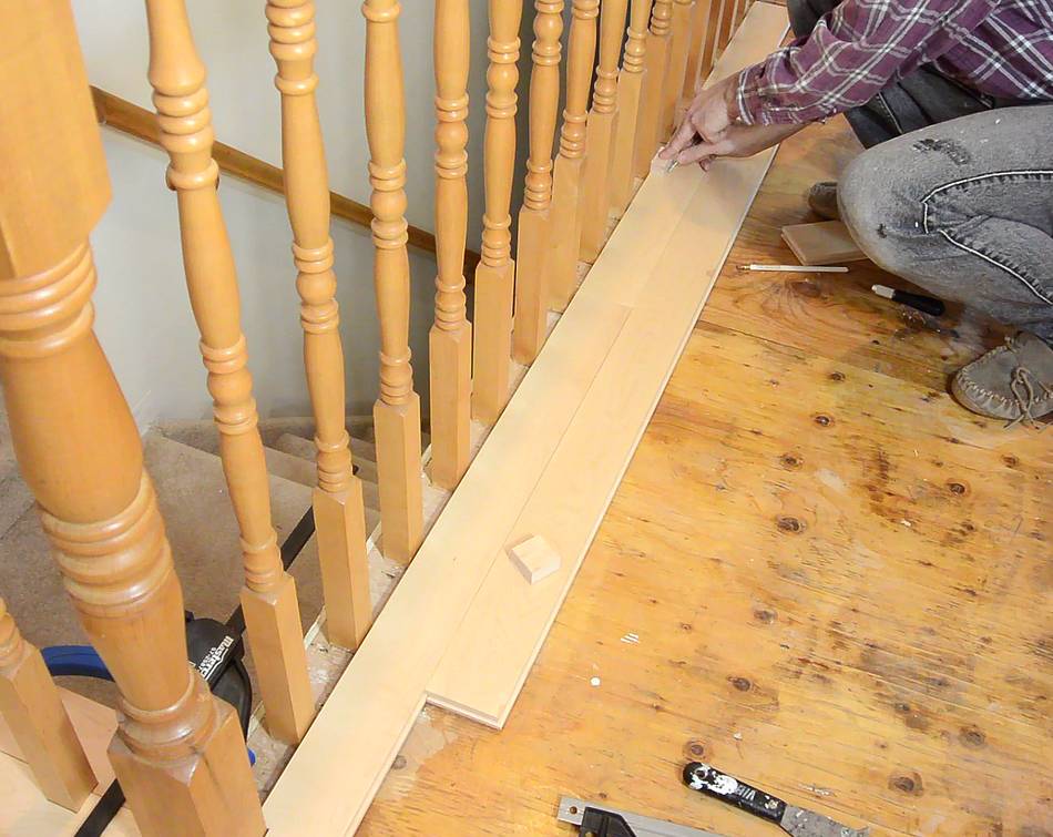 Fitting Flooring Around Stair Rail Spindles